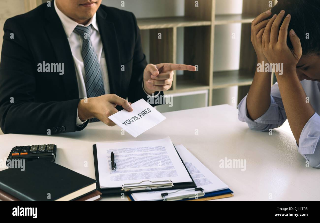 Male employee used the hand to hold the fired envelope while being ...