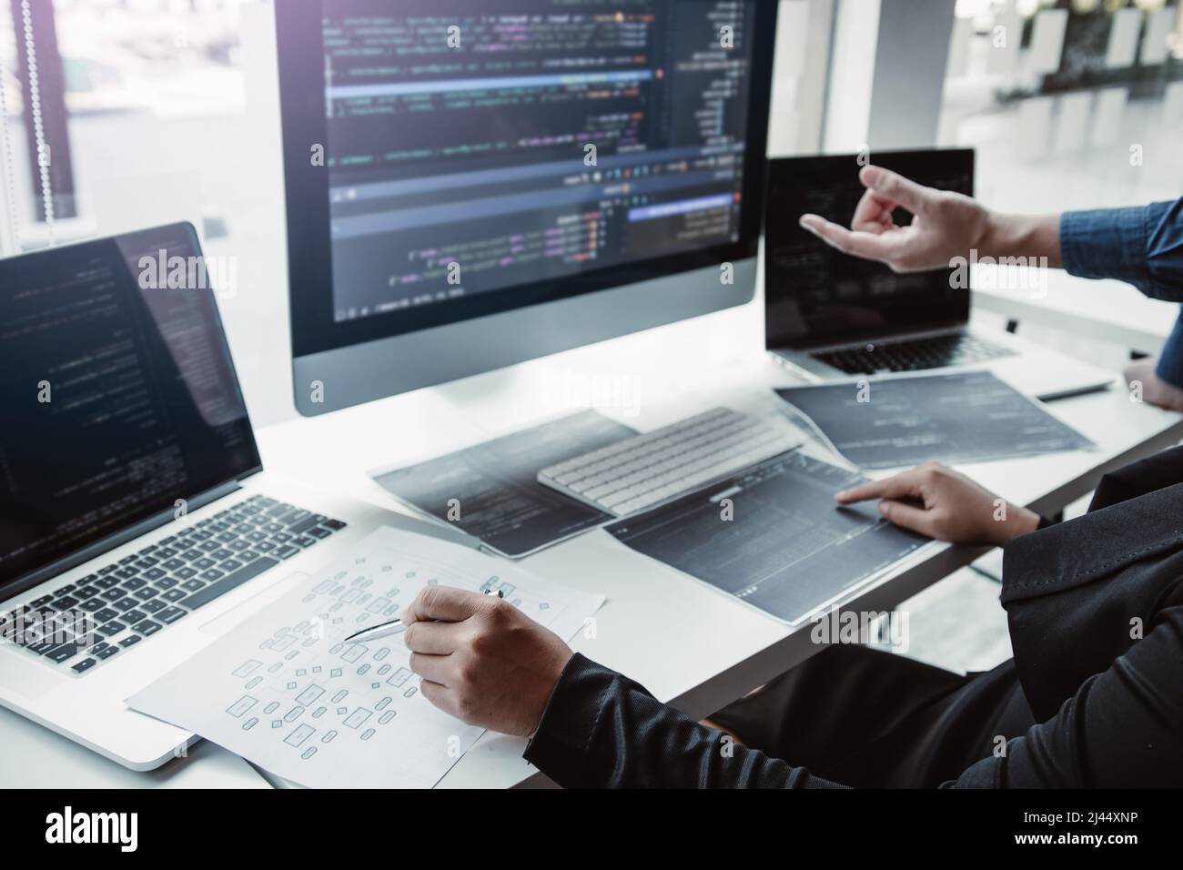 Two asian team working development of programming and encryption ...