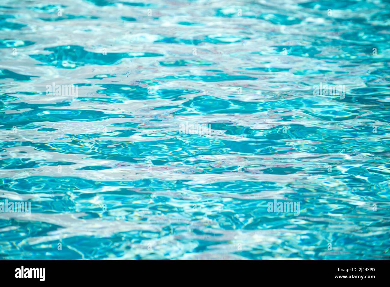 Water in swimming pool, background with high resolution. Wave abstract ...