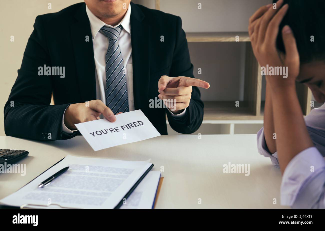 Male employee used the hand to hold the fired envelope while being ...