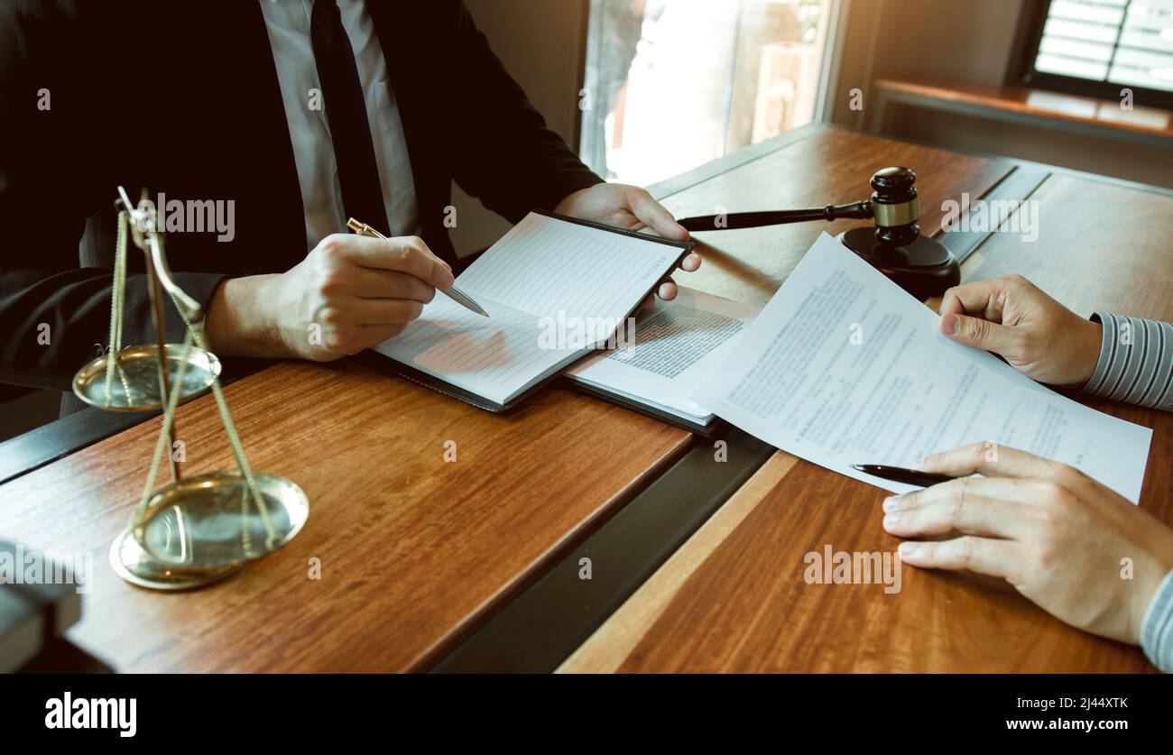 Business lawyer is currently counseling the client's trial at the ...