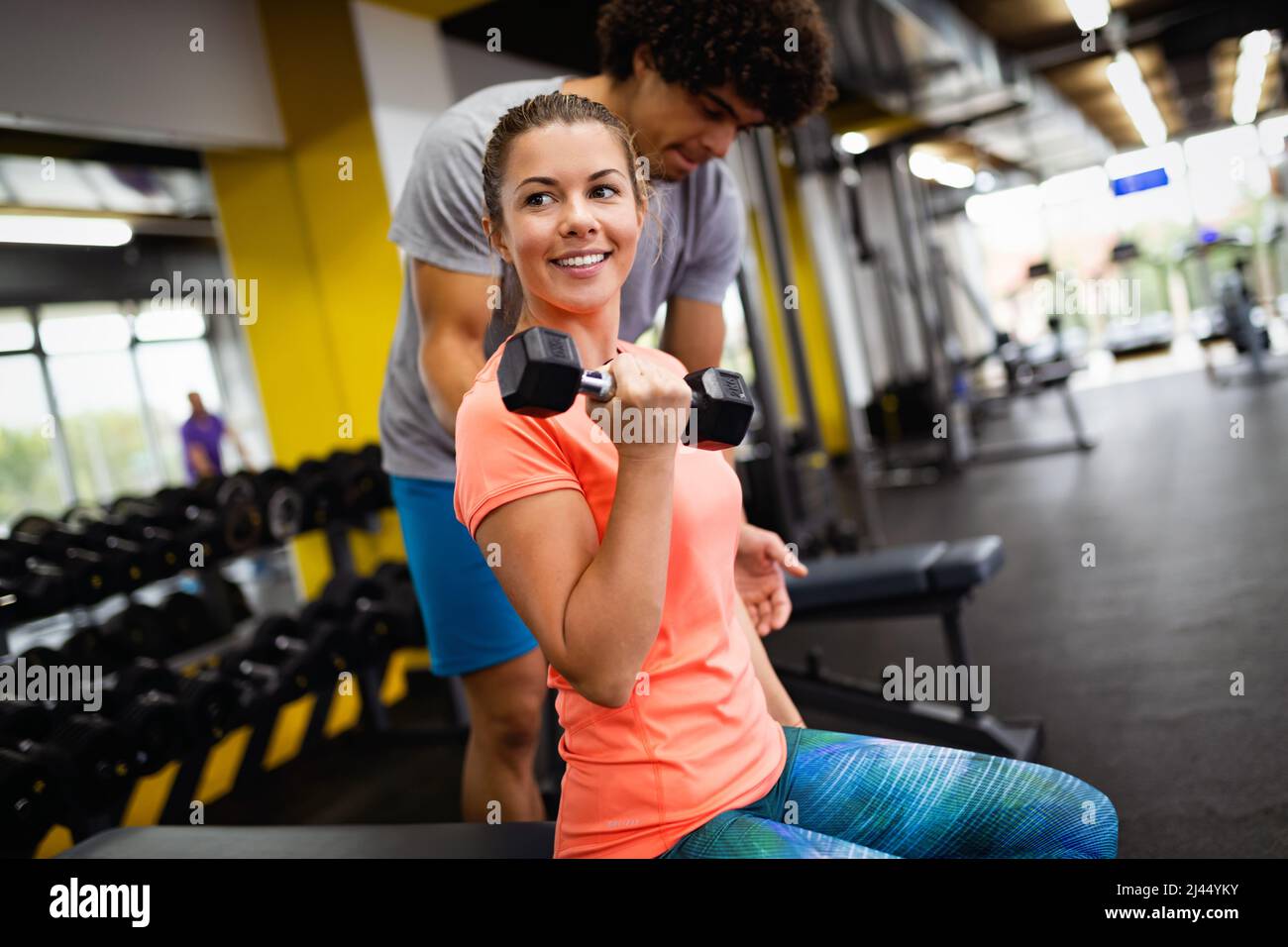 Portrait of happy fit people, friends exercising in gym together. Sport ...