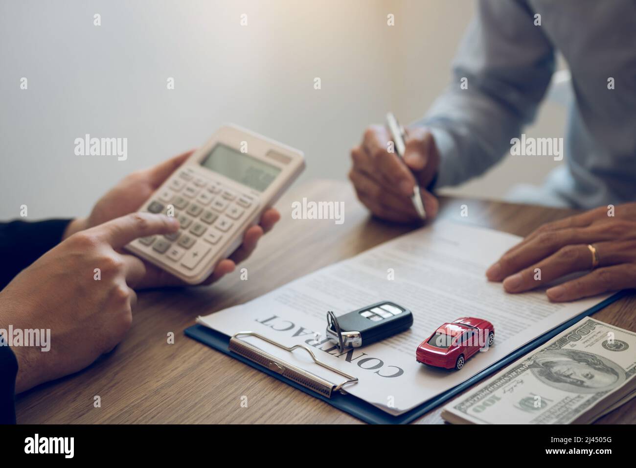 Finance manager of the car showroom is calculating the cost of ...