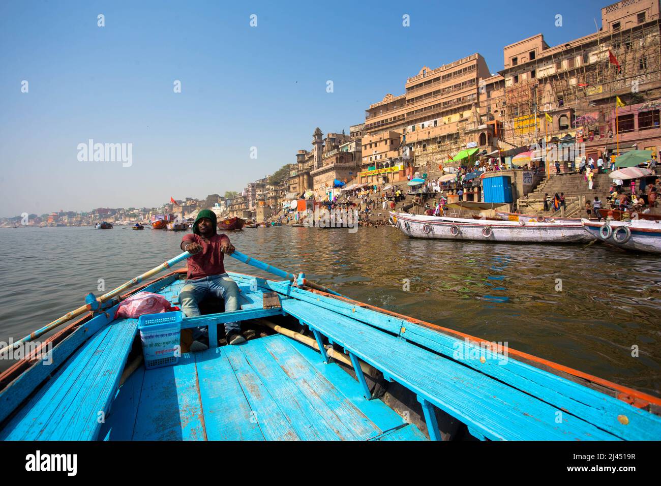 The boatman on holi Gangga river Stock Photo - Alamy