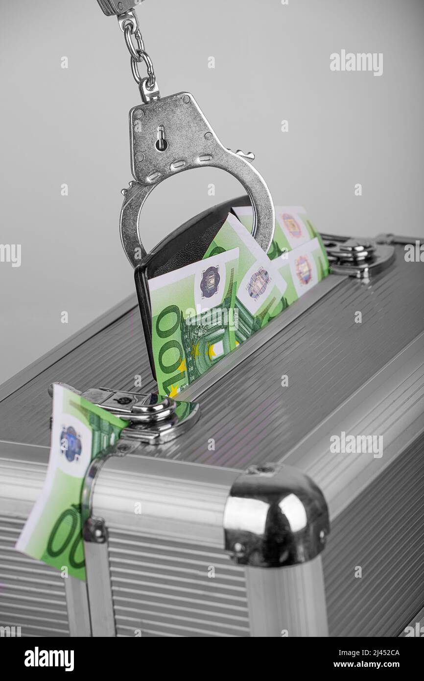 Handcuffs and briefcase hi-res stock photography and images - Alamy