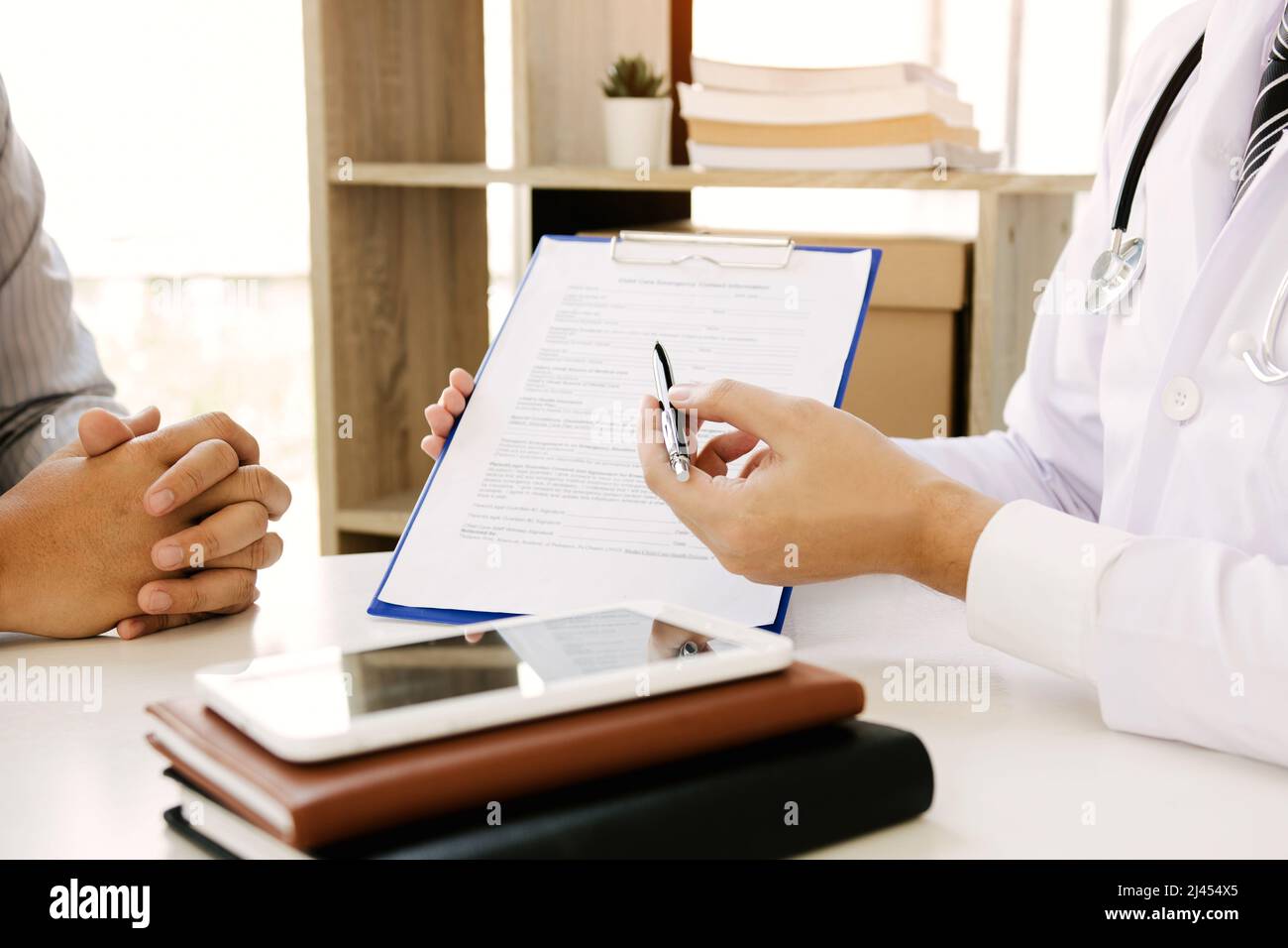 Doctor is explaining the drug's properties to the patient and ...