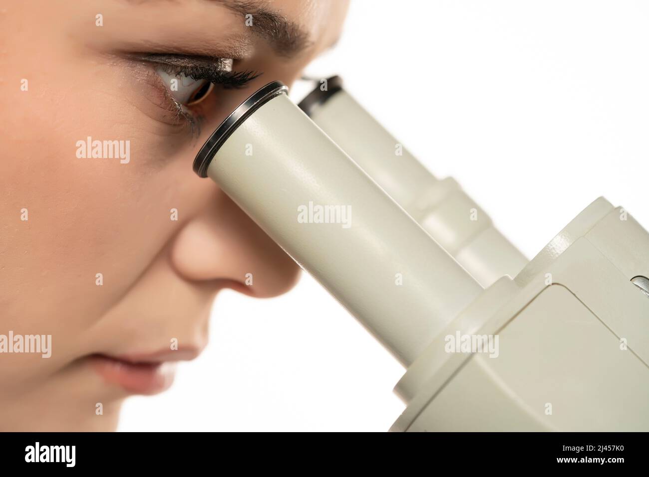 Macro Close Up Shot of a Female Scientist Looking into the Microscope ...