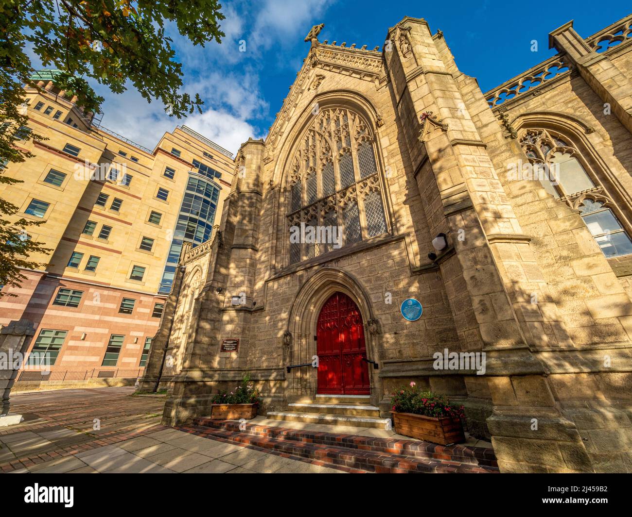 West facade of Mill Hill Chapel, with its bright red doors. Park Row ...