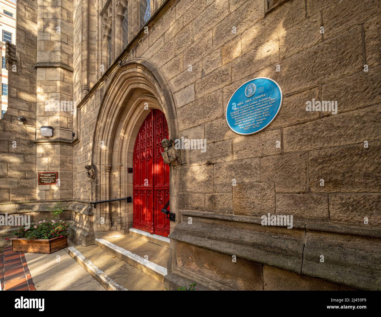 Red door and blue plaque of Mill Hill Chapel in Park Row, Leeds. West ...