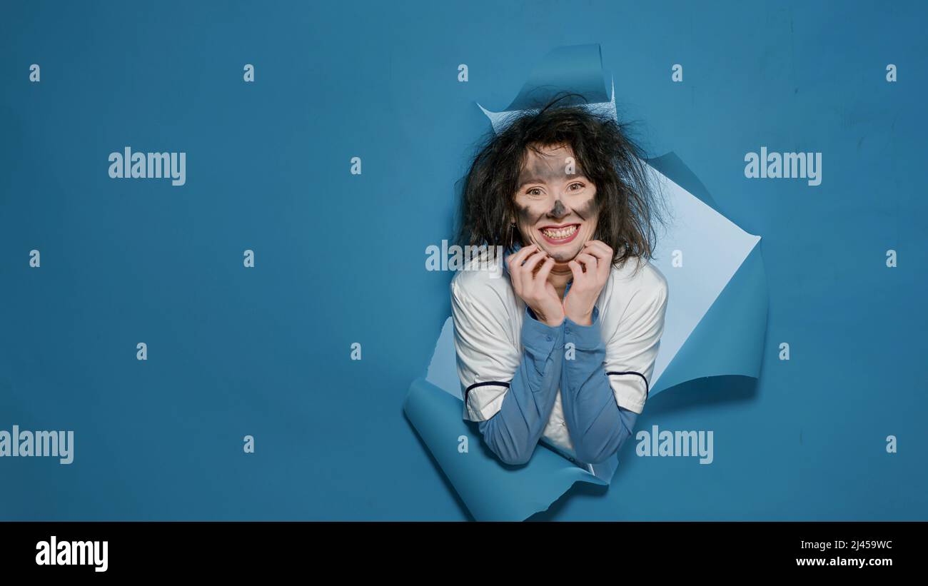 Goofy mad woman chemist sticking tongue out and acting crazy, doing ...