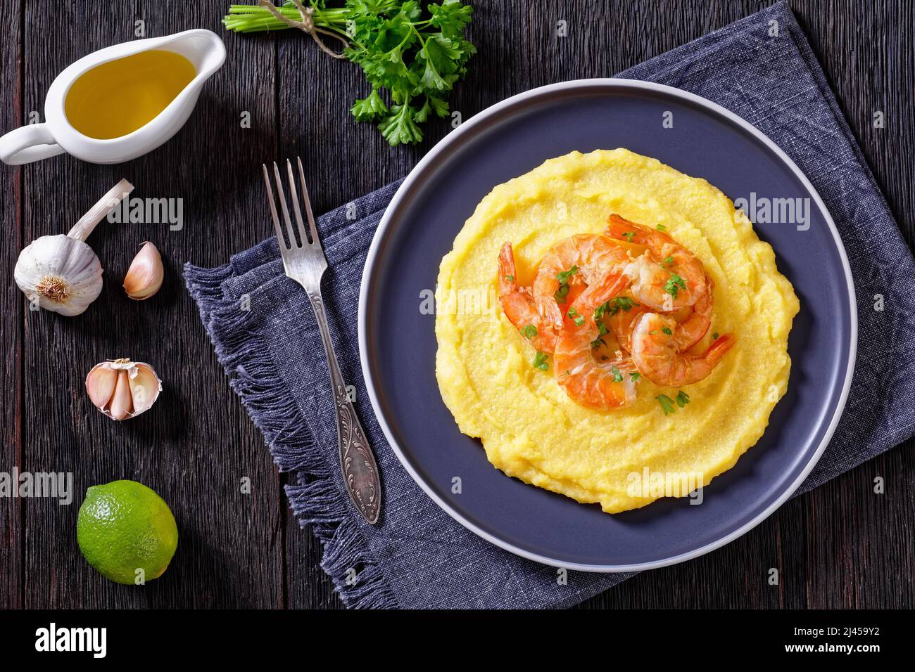 Polenta e schie fritte, venetian dish, polenta with fried shrimps on a ...