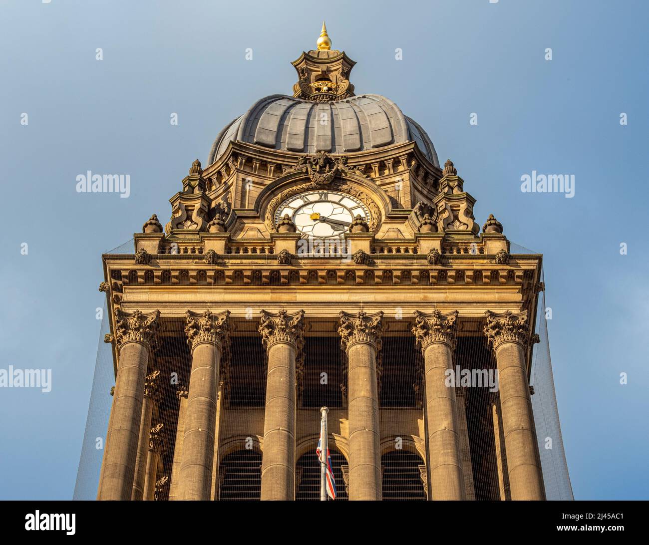 Leeds Town Hall clock seen against a blue sky. Leeds. West Yorkshire.UK ...
