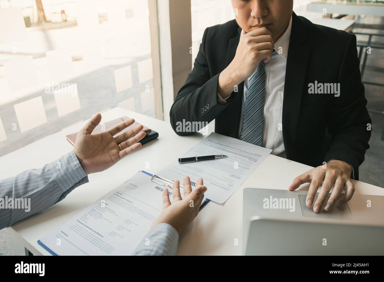 Employees are explaining about their past work experience for job ...