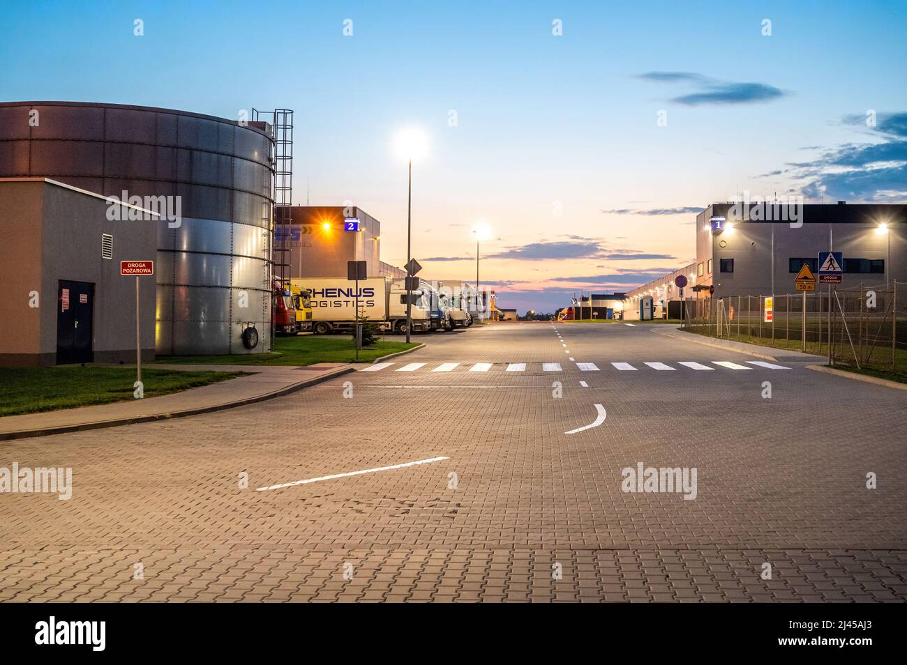 Road leading to the warehouse entrance Stock Photo - Alamy