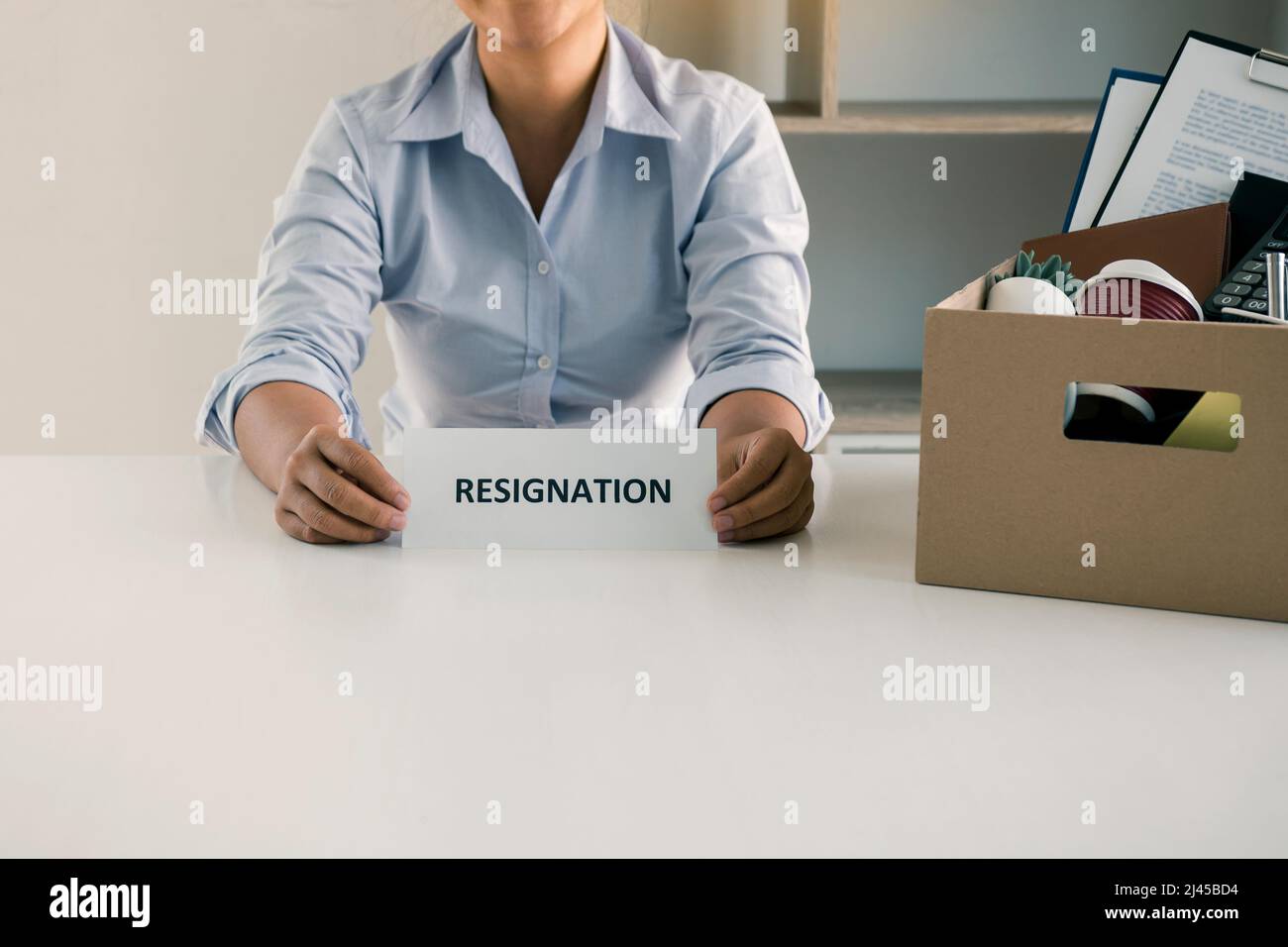 Female employee is about to submit a resignation at his office Stock ...