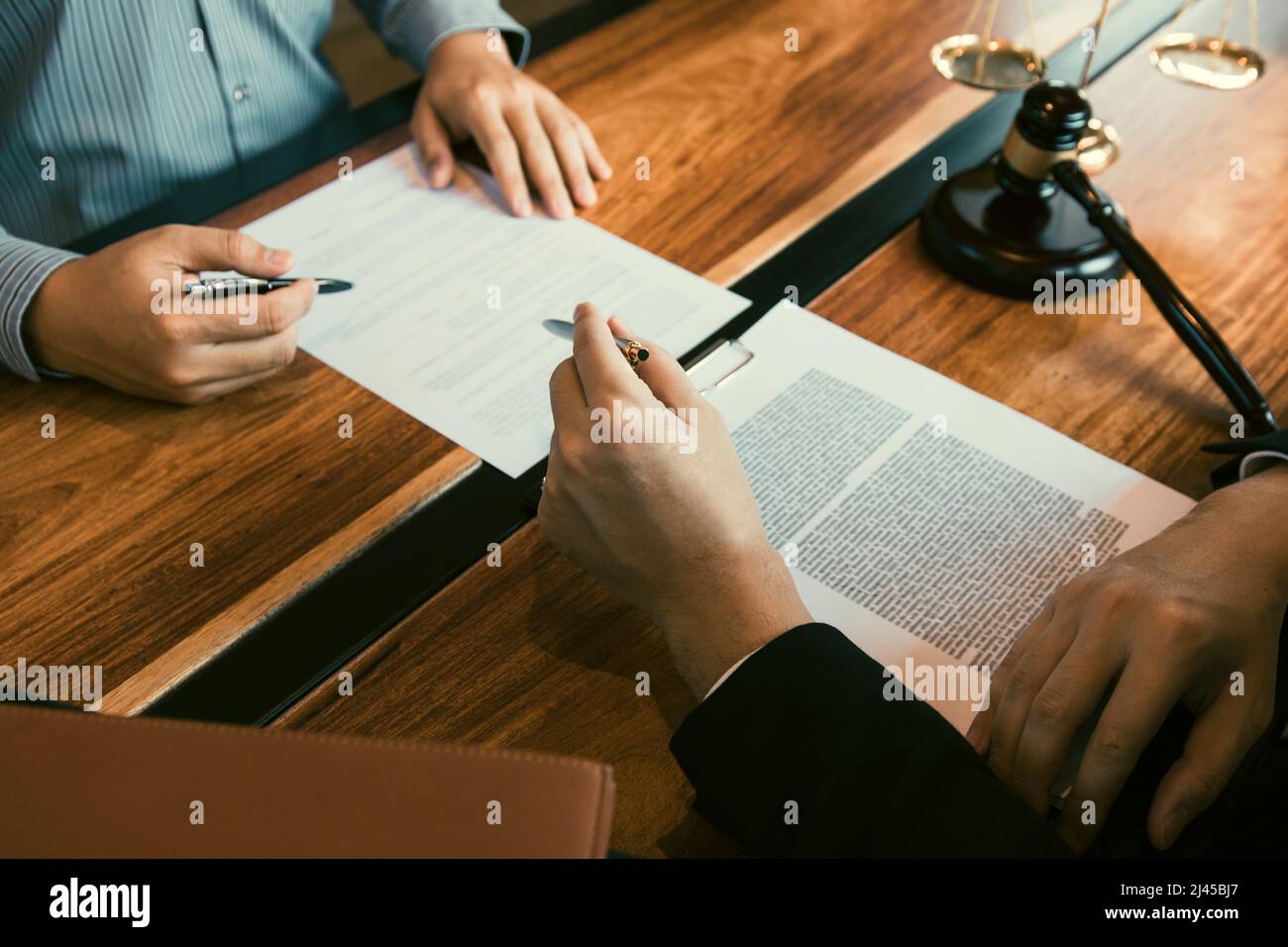 Lawyer is explaining about the wrongdoing laws regarding fraud to the ...