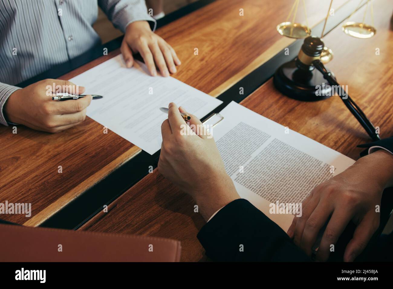 Lawyer is explaining about the wrongdoing laws regarding fraud to the ...