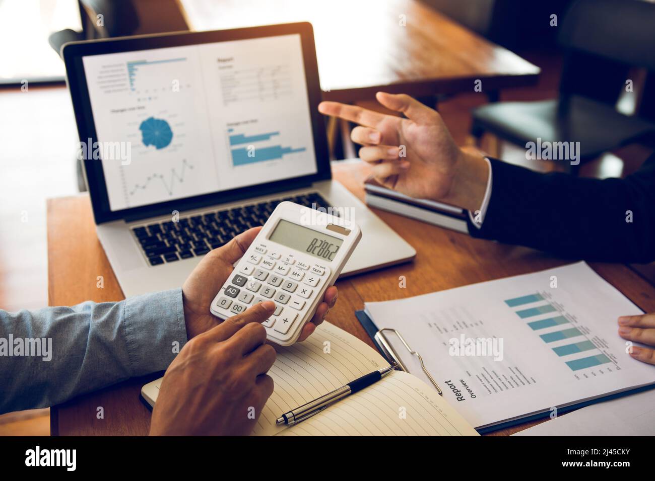 Managers are using tablets to analyze sales cost reports and explain ...