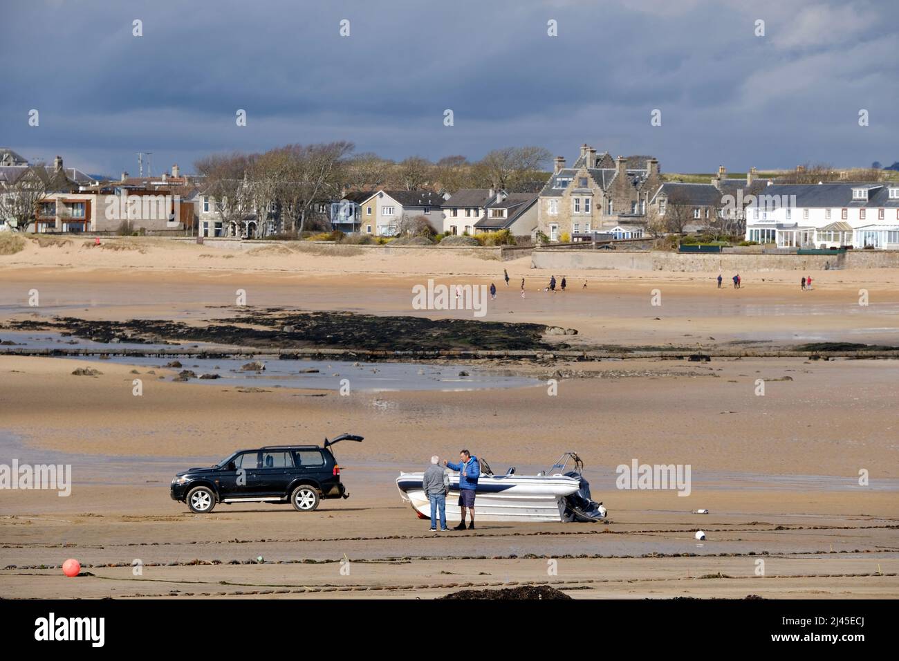 Elie Fife Scotland a coastal resort village, the tide is out and locals ...