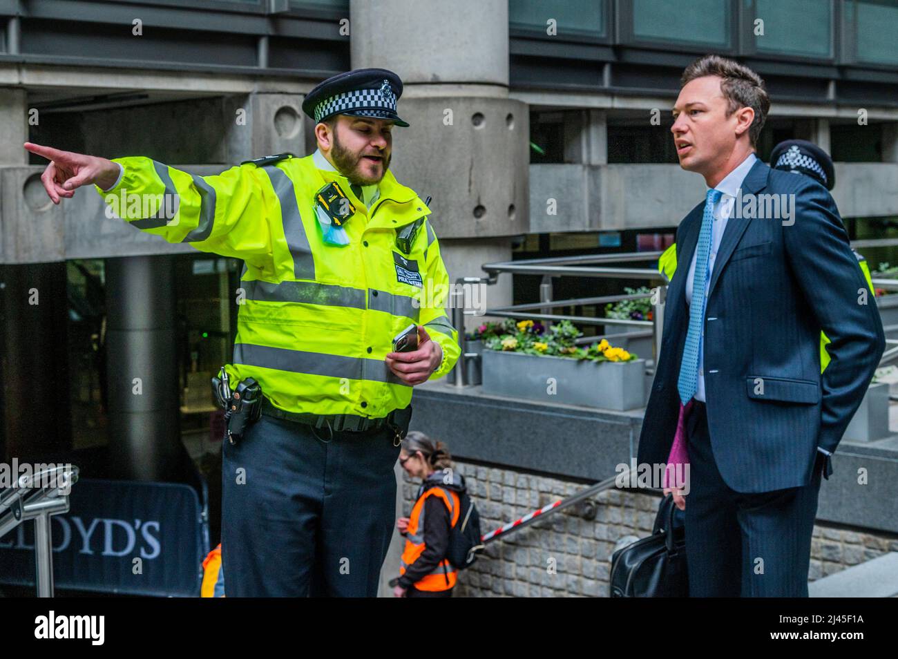 London, UK. 12 Apr 2022. Lloyds workers already inside are allowed out ...