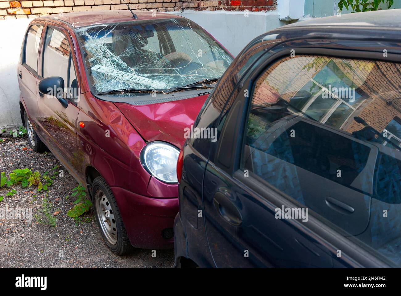 Two cars collided. Crash. One car caught up with another Stock Photo ...