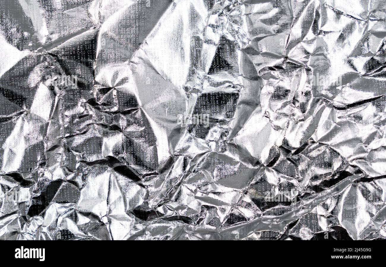 Crumpled and shiny silver paper background. High quality photo Stock ...