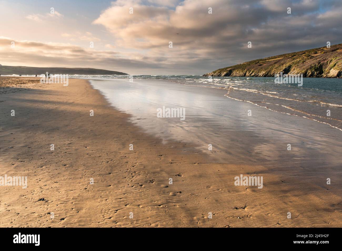 Evening light over the incoming tide on the award winning Crantock ...