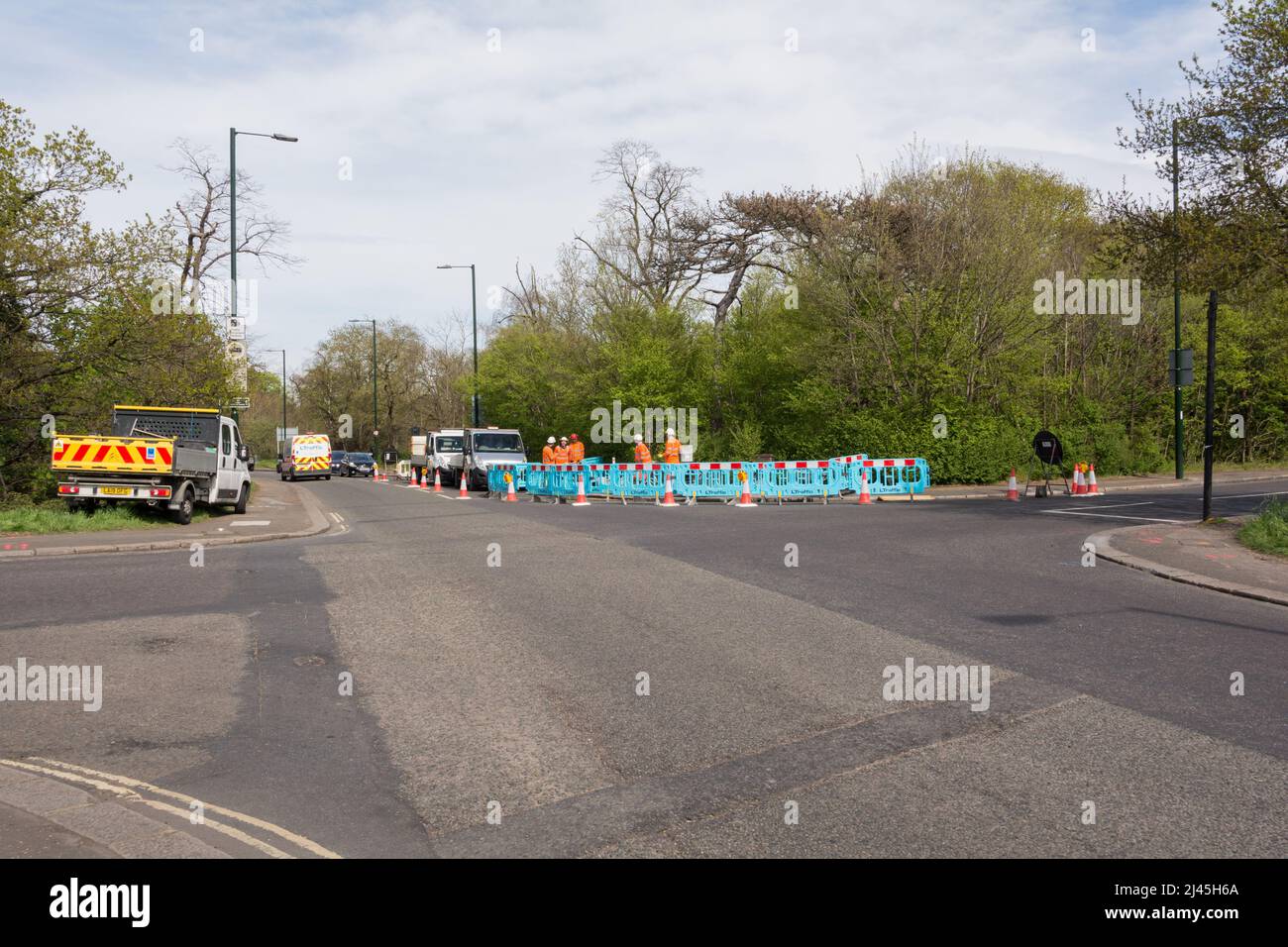Roadworks and temporary traffic lights at the Mill Hill crossroads on ...