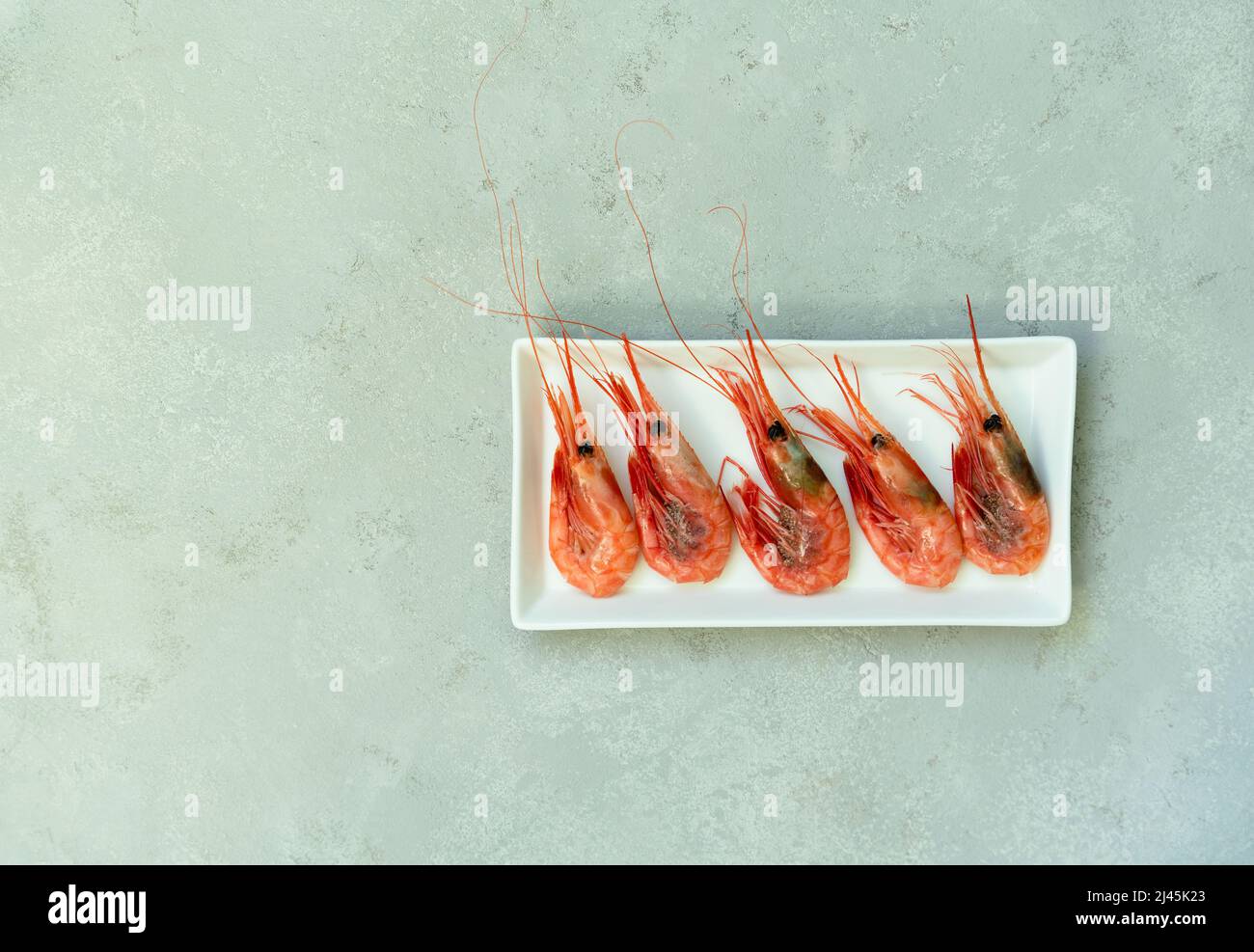 The shrimps are on the white plate. High quality photo Stock Photo - Alamy