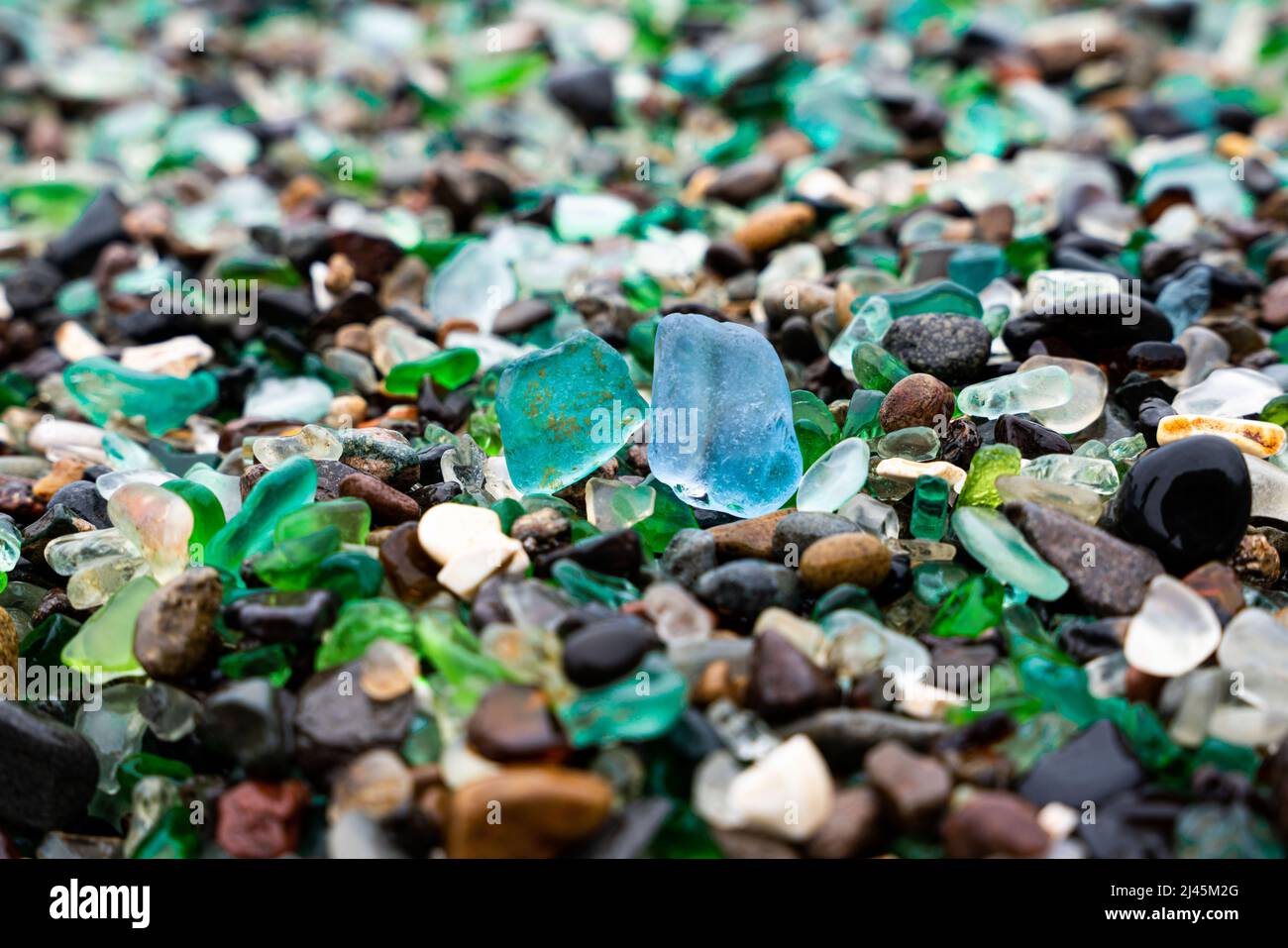 Glass Bay in Vladivostok. Sea-polished colored glass on the beach ...