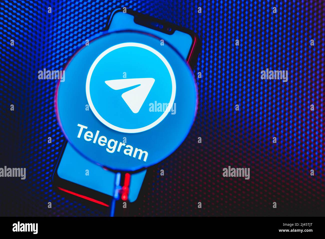 Telegram app logo on the screen smartphone closeup. Telegram is an ...