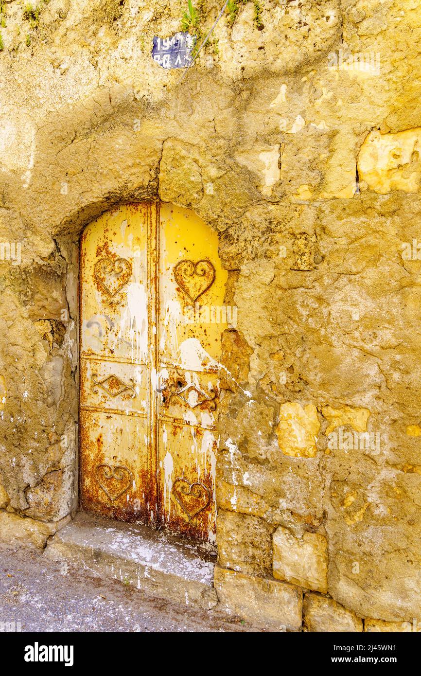 Tayibe, Israel - April 09, 2022: View of an old door in the ancient ...