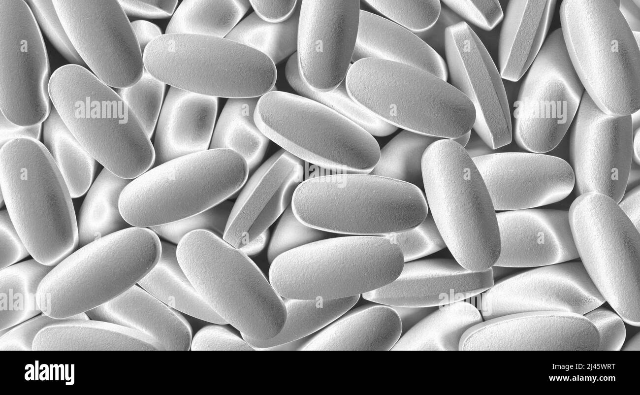 Pop art surreal style futuristic pile of silver oval shaped pills Stock ...