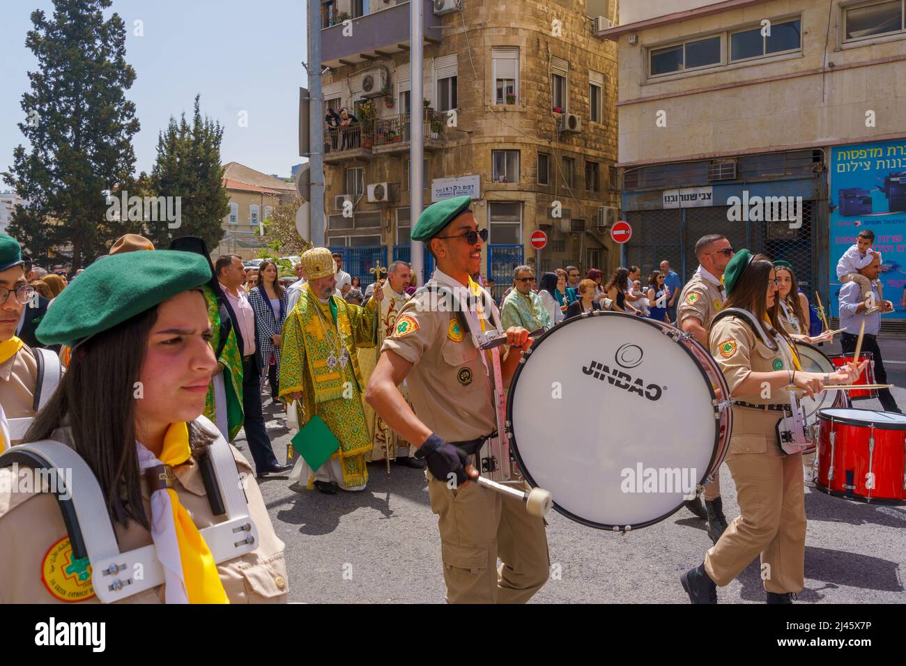 Haifa, Israel - April 10, 2022: Bishop and others take part in the Easter Palm Sunday parade of ...