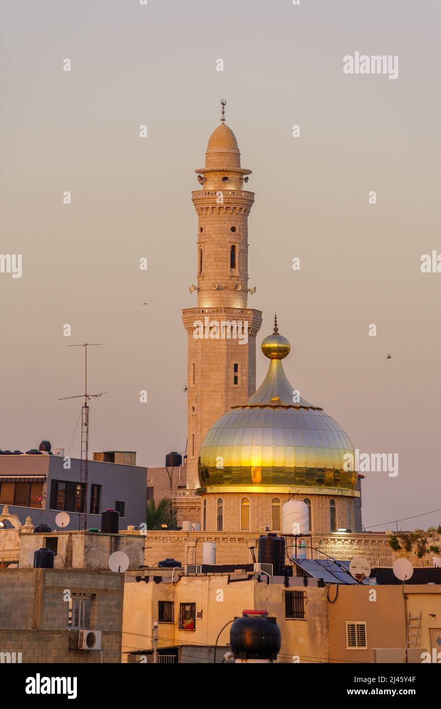 Sunset view of the dome and minaret of Salah al-Din Mosque, in Tayibe ...