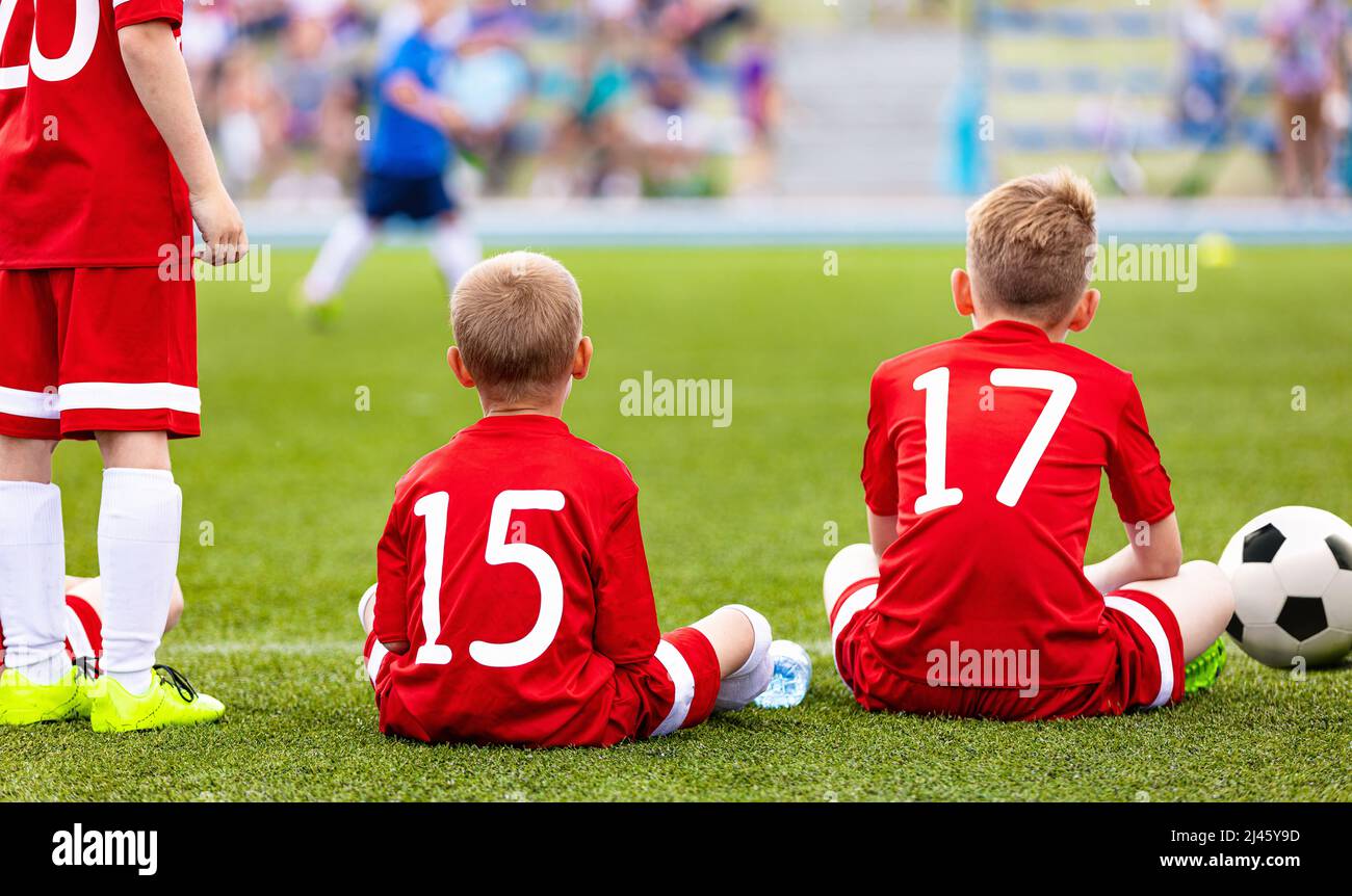 Soccer Kids in a Team Sitting on Grass Field. Children Football ...
