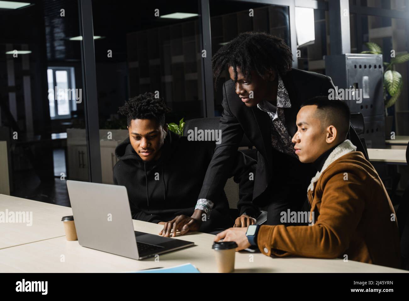 Multiethnic group teamwork of black african and asian employee working ...