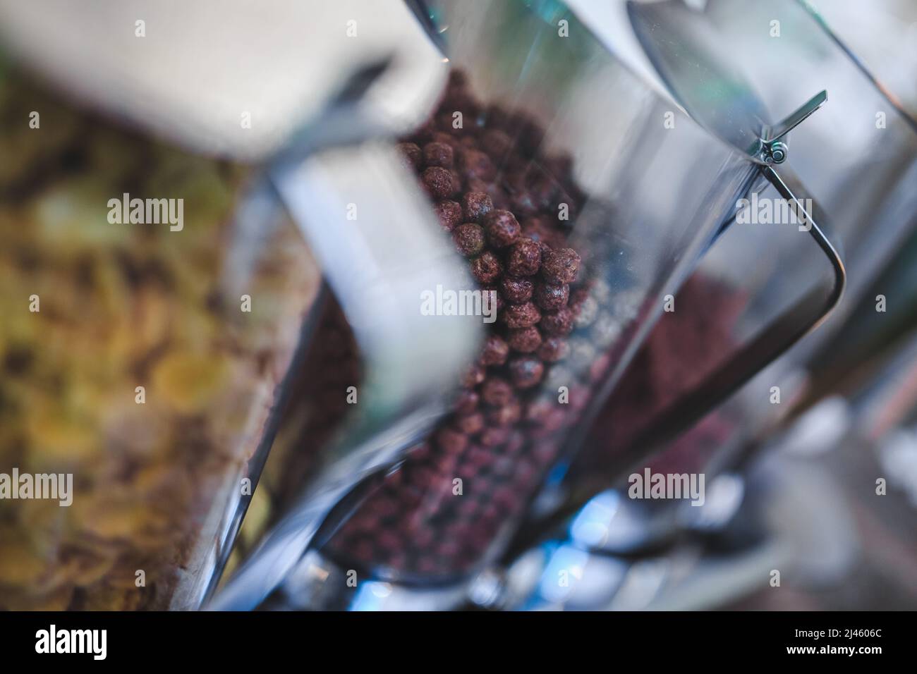 Chocolate round corn flakes in a glass jar on the buffet Stock Photo ...