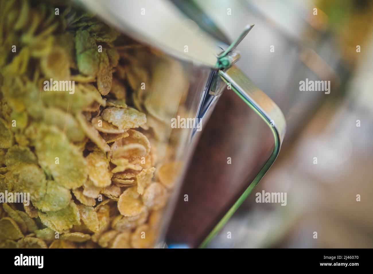 Corn flakes in a glass jar on the buffet Stock Photo - Alamy