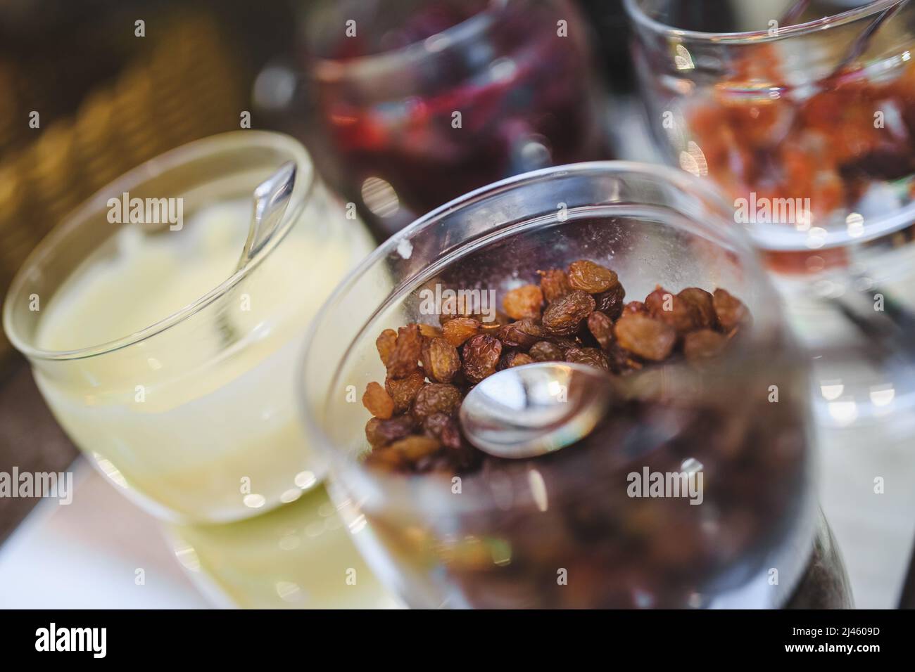 Raisins in glass container hi-res stock photography and images - Alamy