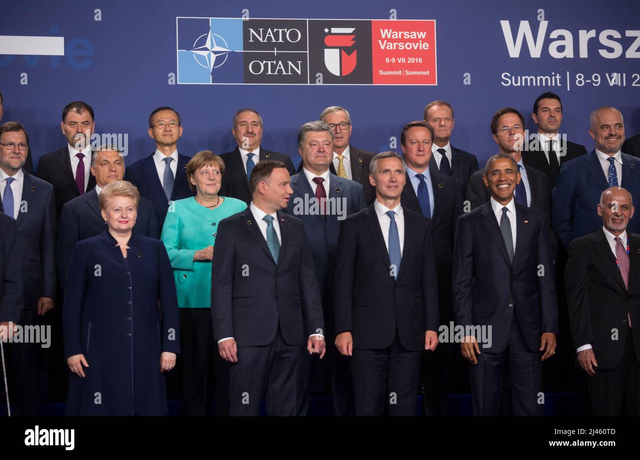 Participants of the NATO summit pose for a group photo in Warsaw Stock ...