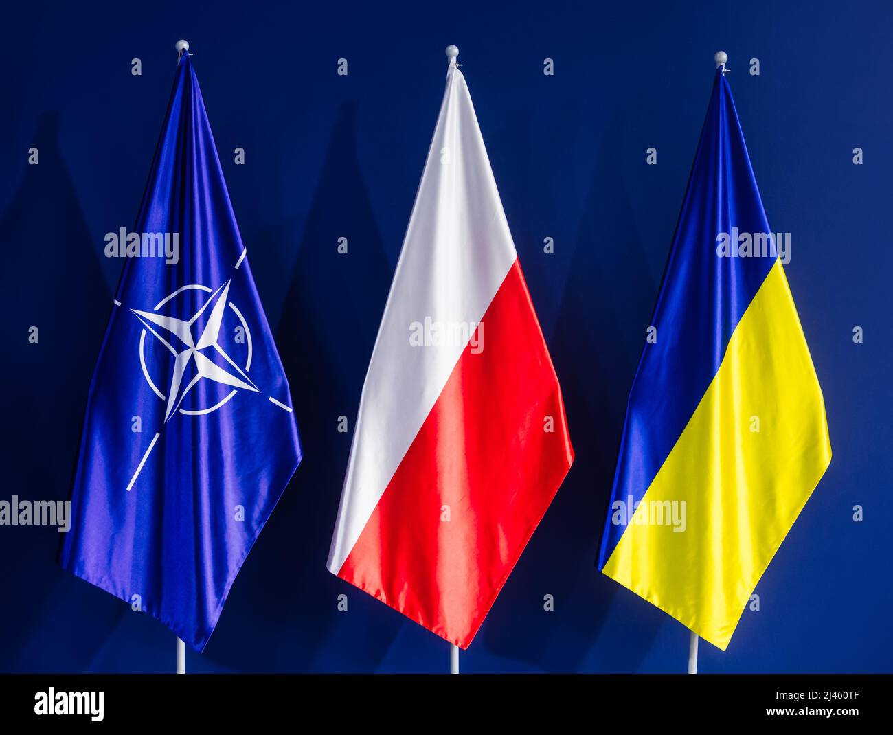 Flags of NATO, Poland and Ukraine seen during the NATO summit in Warsaw ...