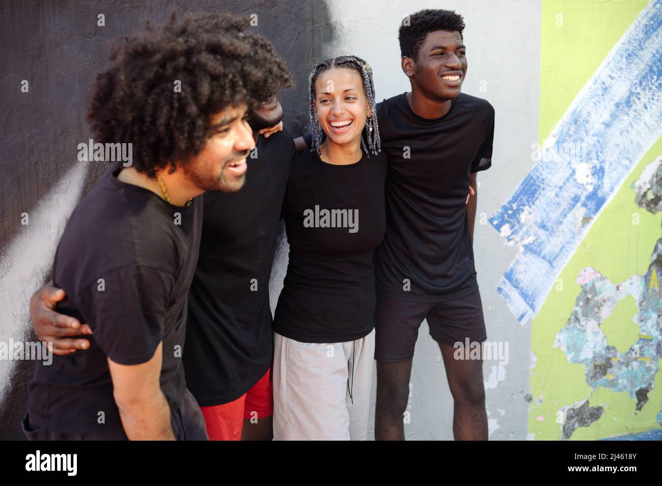 Diverse young friends smiling with positive attitude Stock Photo - Alamy