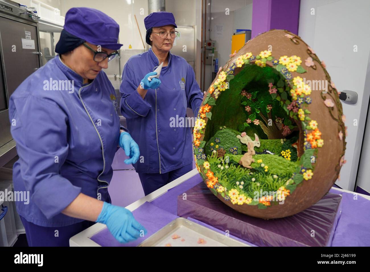 Cadbury World chocolatiers Dawn Jenks and Donna Oluban add the ...