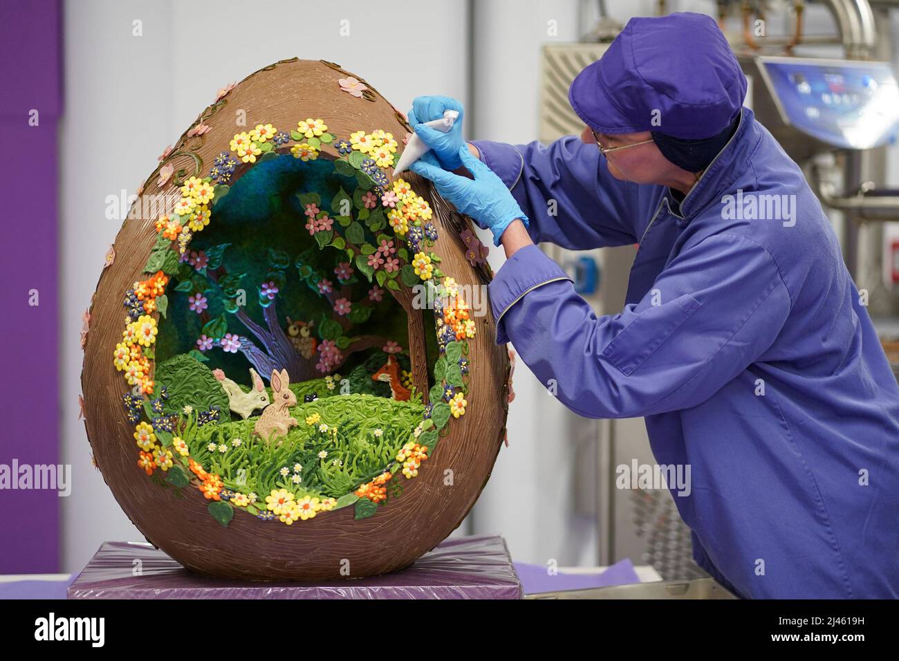 Cadbury World chocolatier Dawn Jenks adds the finishing touches to the ...