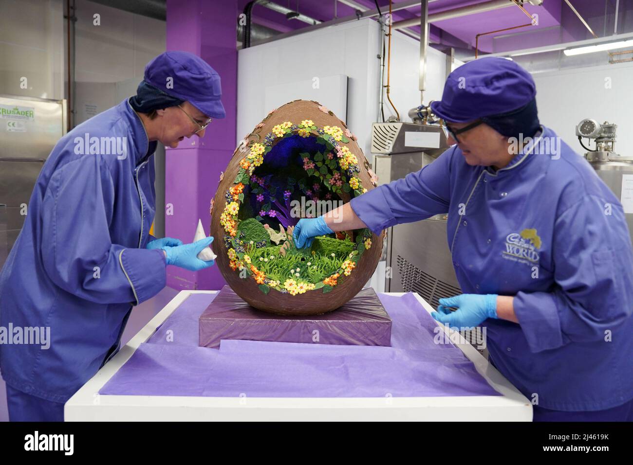 Cadbury World chocolatiers Dawn Jenks and Donna Oluban add the ...