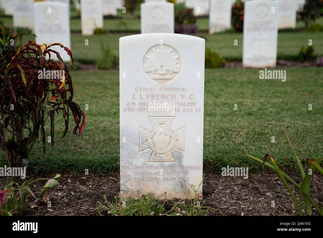 The grave of a soldier visited by the Princess Royal and Vice Admiral ...