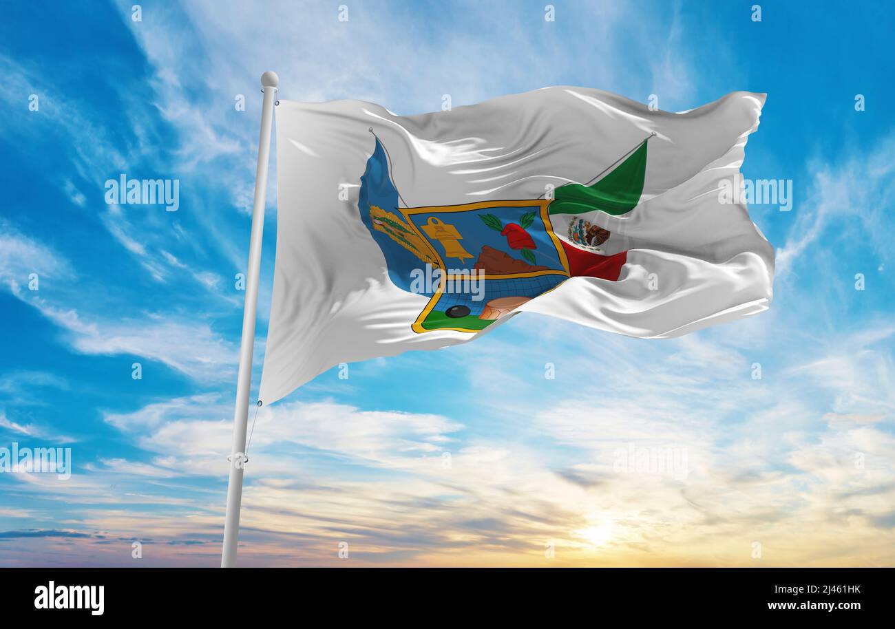flag of Hidalgo , Mexico at cloudy sky background on sunset, panoramic ...