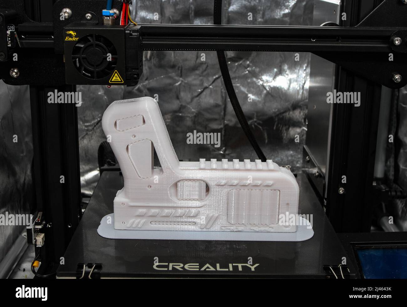 A frame for a Maverick-V2 revolver is printed on an Ender 3 printer in ...