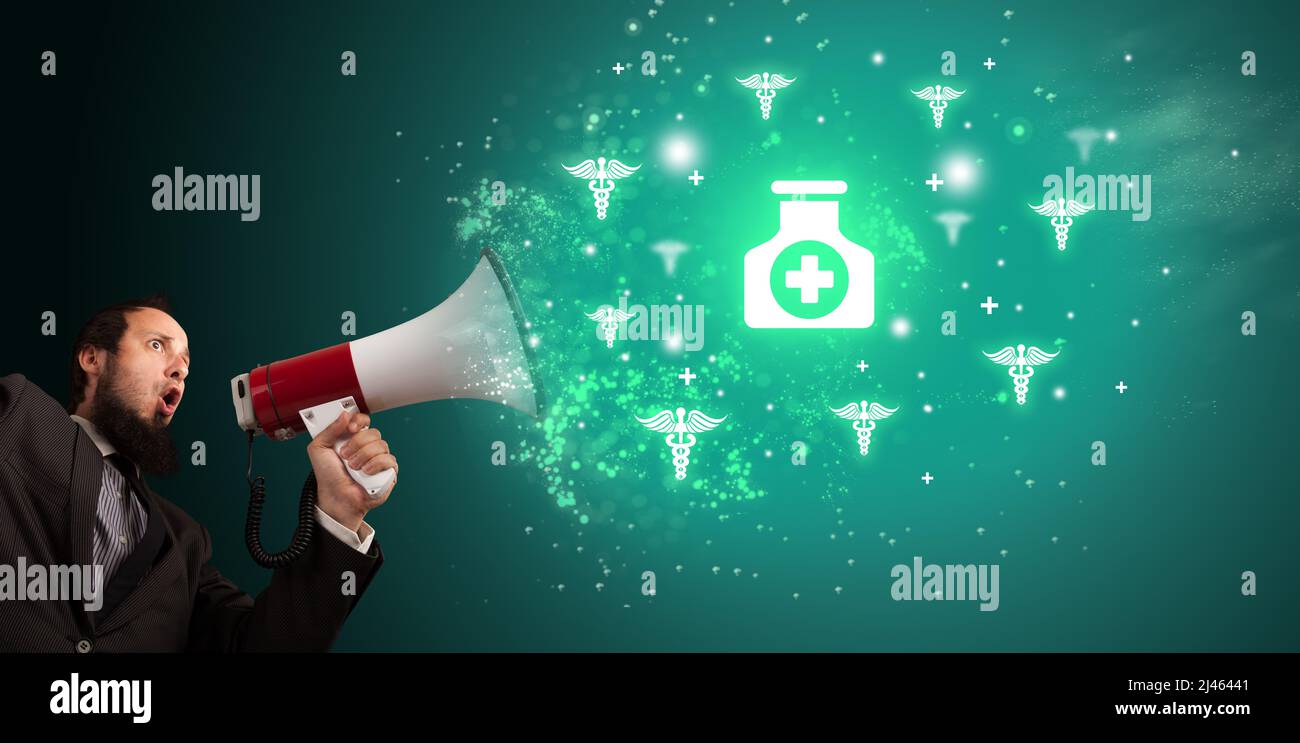 Young person with megaphone and healthcare icon Stock Photo - Alamy